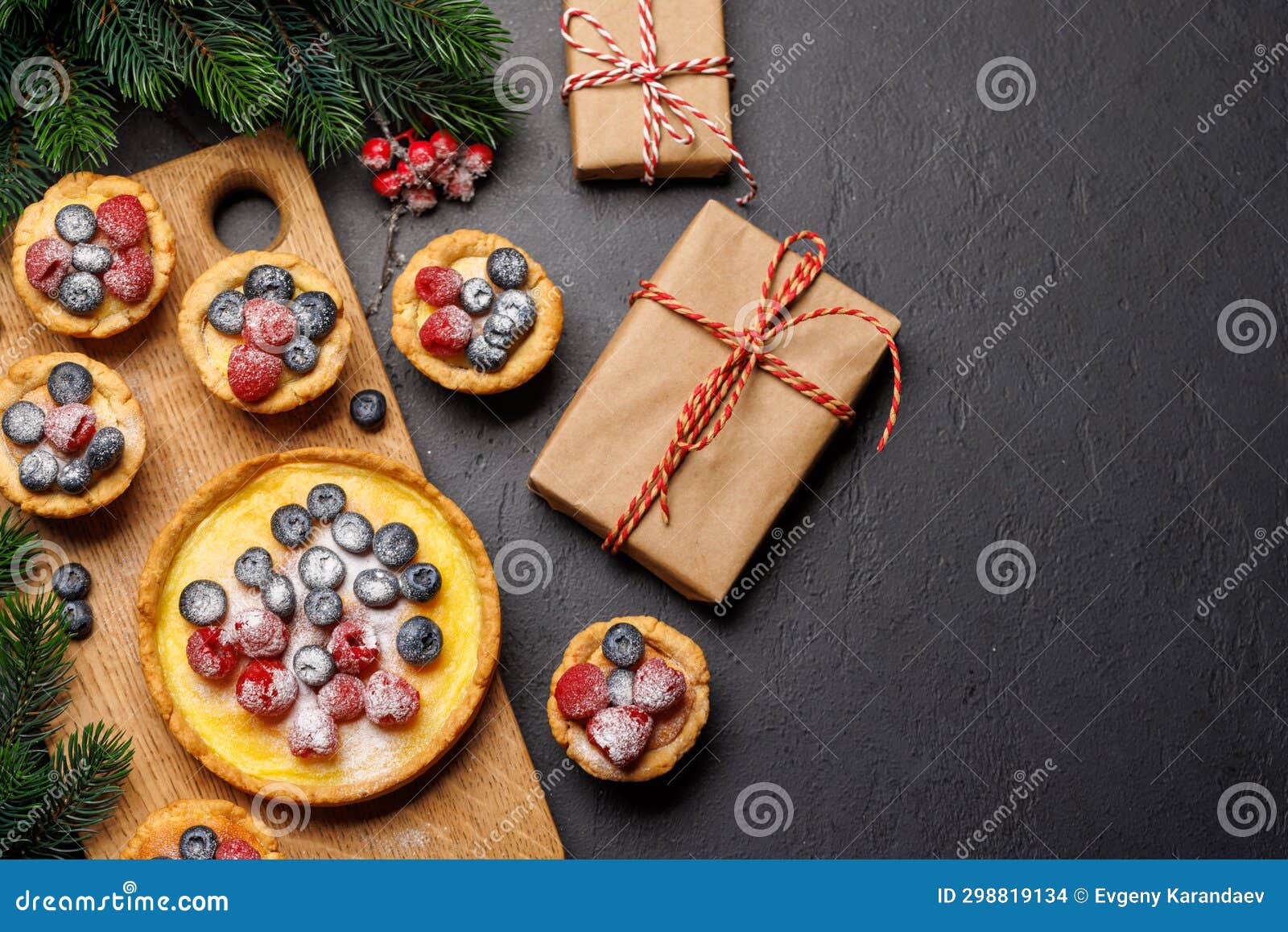 Festive Delight: Christmas Cupcakes Adorned with Berries Stock Photo ...