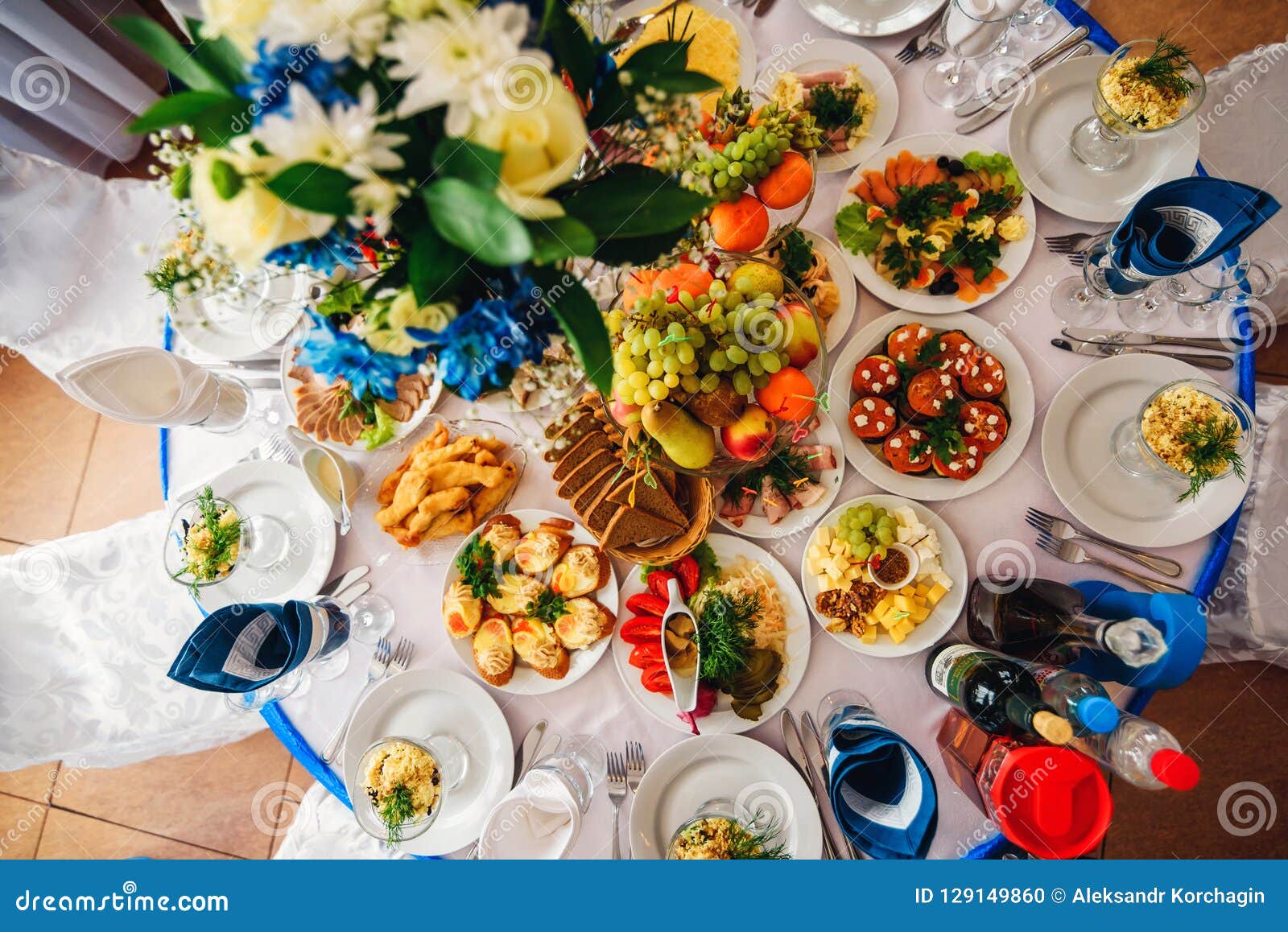 Festive Dinner Table in the Restaurant with Various Food and Drinks ...