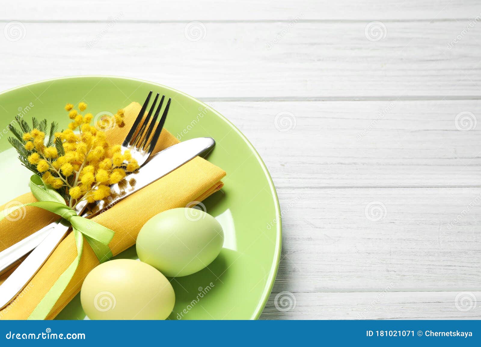 Festive Easter Table Setting with Eggs and Floral Decor on White ...