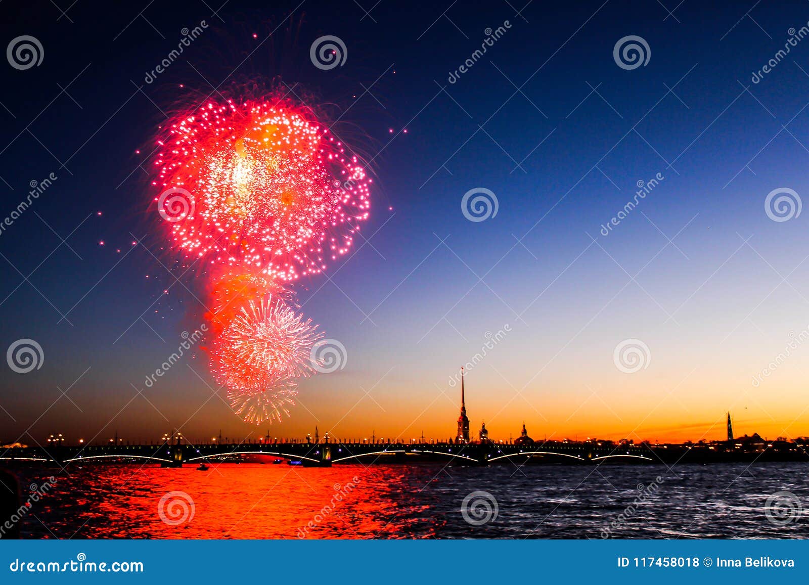Festive Fireworks on the Waterfront at Sunset Stock Photo - Image of ...