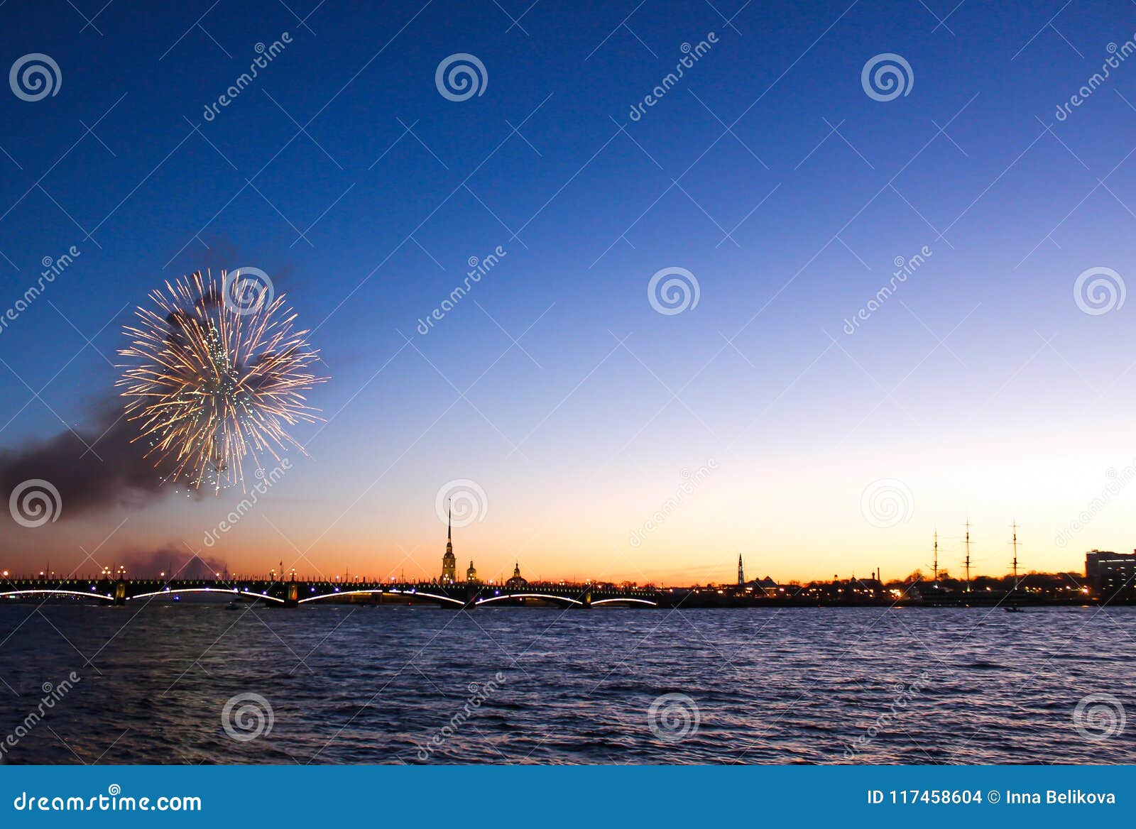 Festive Fireworks on the Waterfront at Sunset Stock Photo - Image of ...