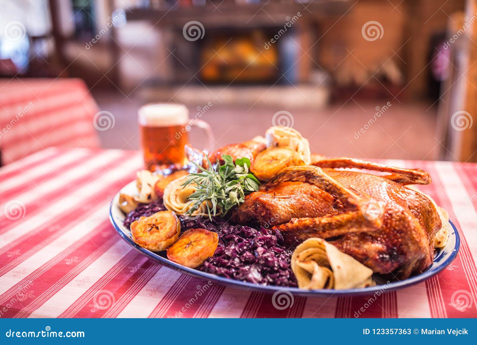 Festive Garnished Roast Duck with Apples and Red Cabbage Stock Image ...
