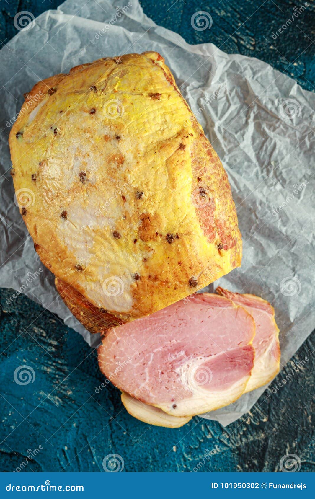 Festive Ham Sliced on Crumpled Rustic Paper Stock Photo - Image of ...
