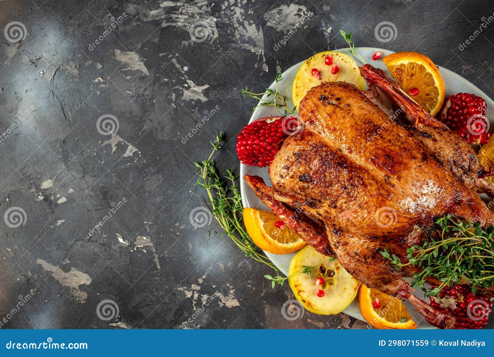 Festive Roast Duck with Apples on a Dark Background. Top View Stock ...