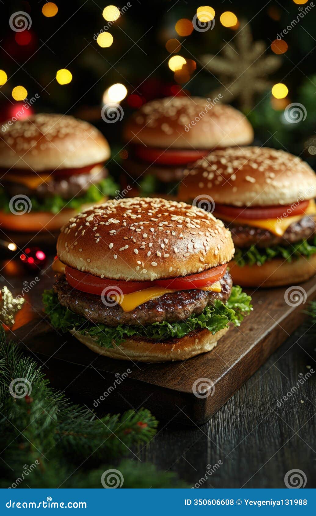 A Group of Burgers on the Table with a Christmas Tree in the Background ...