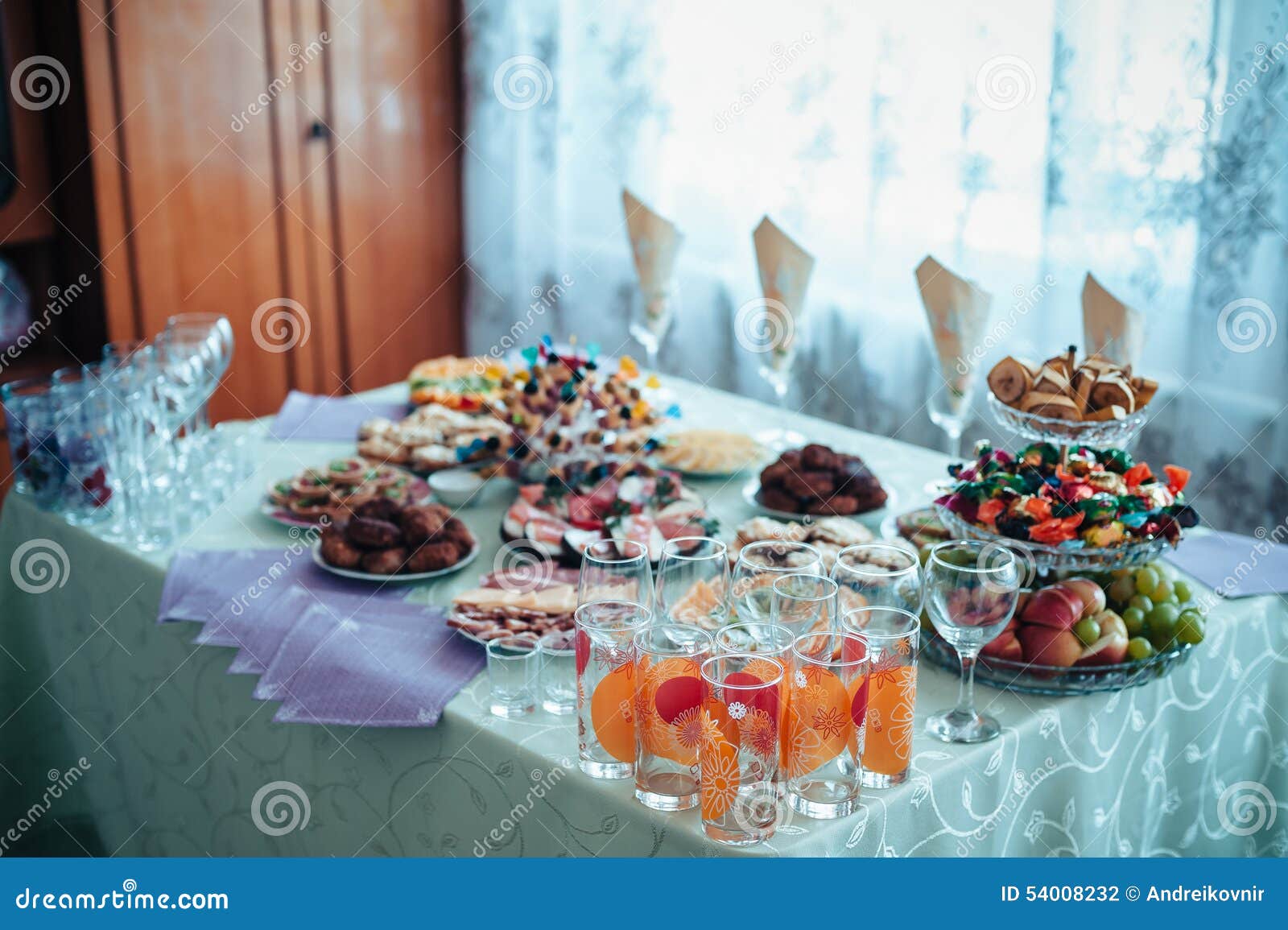 Festive Well-laid Table with Food and Drink Stock Photo - Image of ...