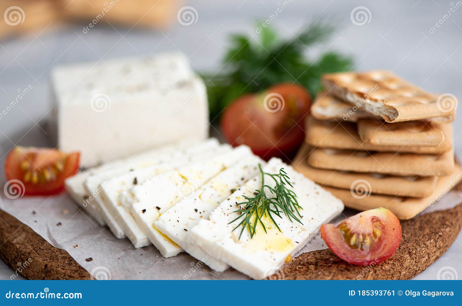 Feta Cheese with Wheat Crackers, Herbs and Olive Oil Stock Image ...