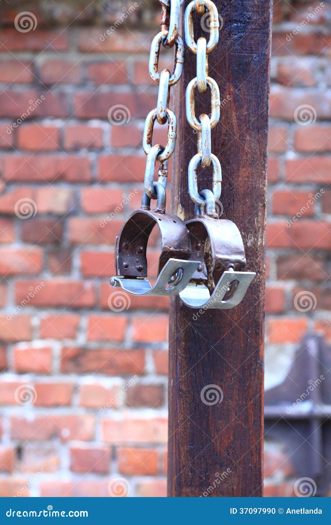 Fetters, Manacles on Brick Background Stock Photo - Image of rusted ...