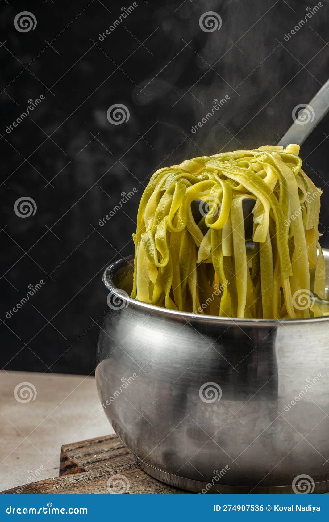 Fettuccine Pasta in Pan Cooking in Boiling. Vertical Image. Top View ...