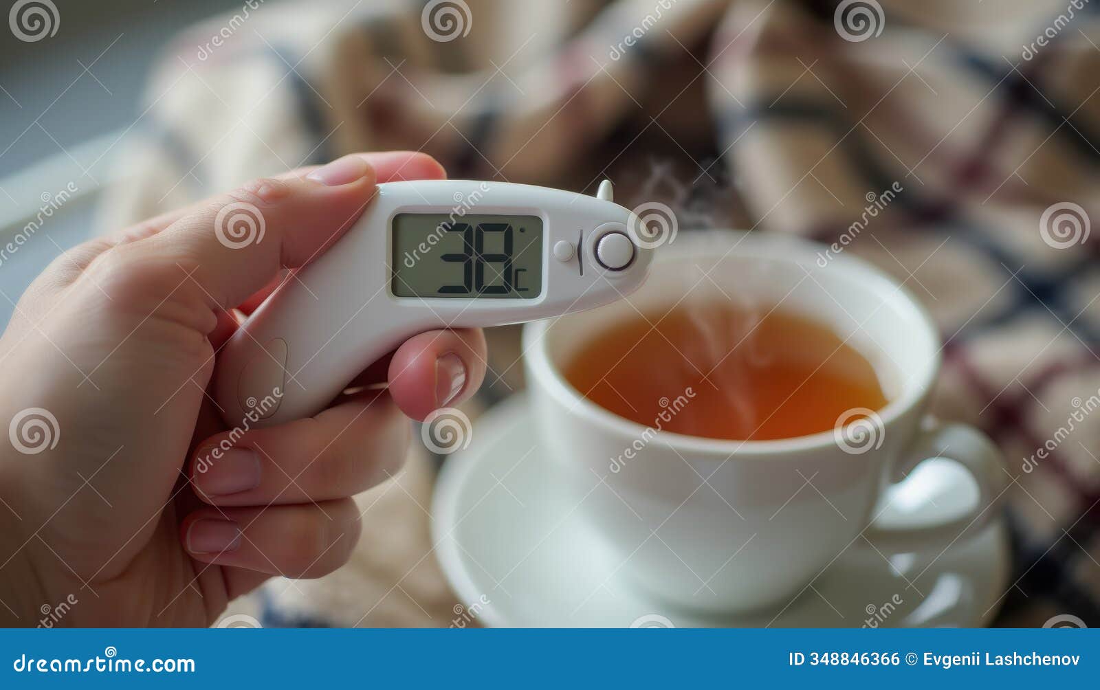 Fever Measurement with Thermometer and Hot Tea in Comfortable Setting ...