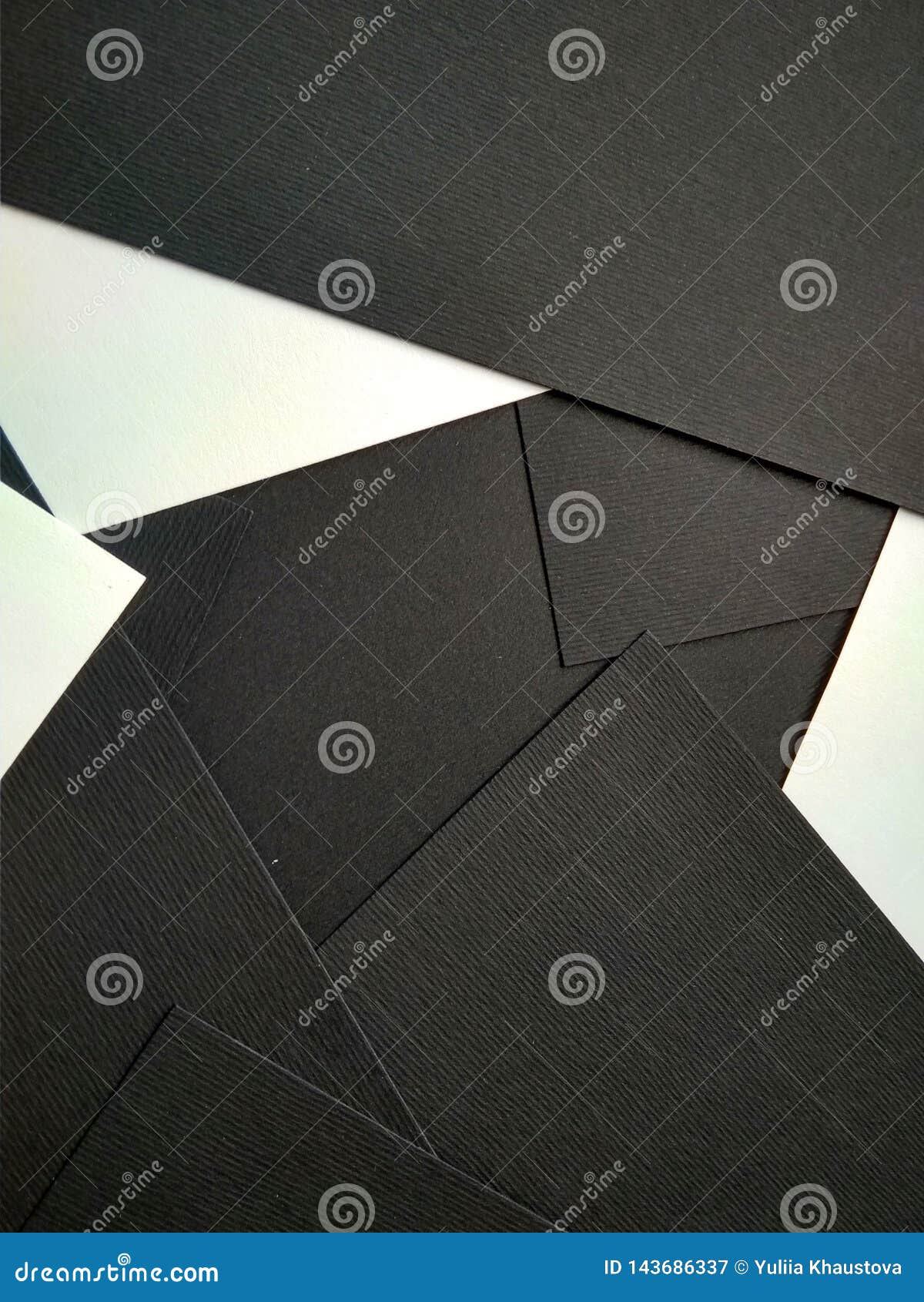 Few Black Papers Folded with Color Paper Close Up Stock Image - Image ...