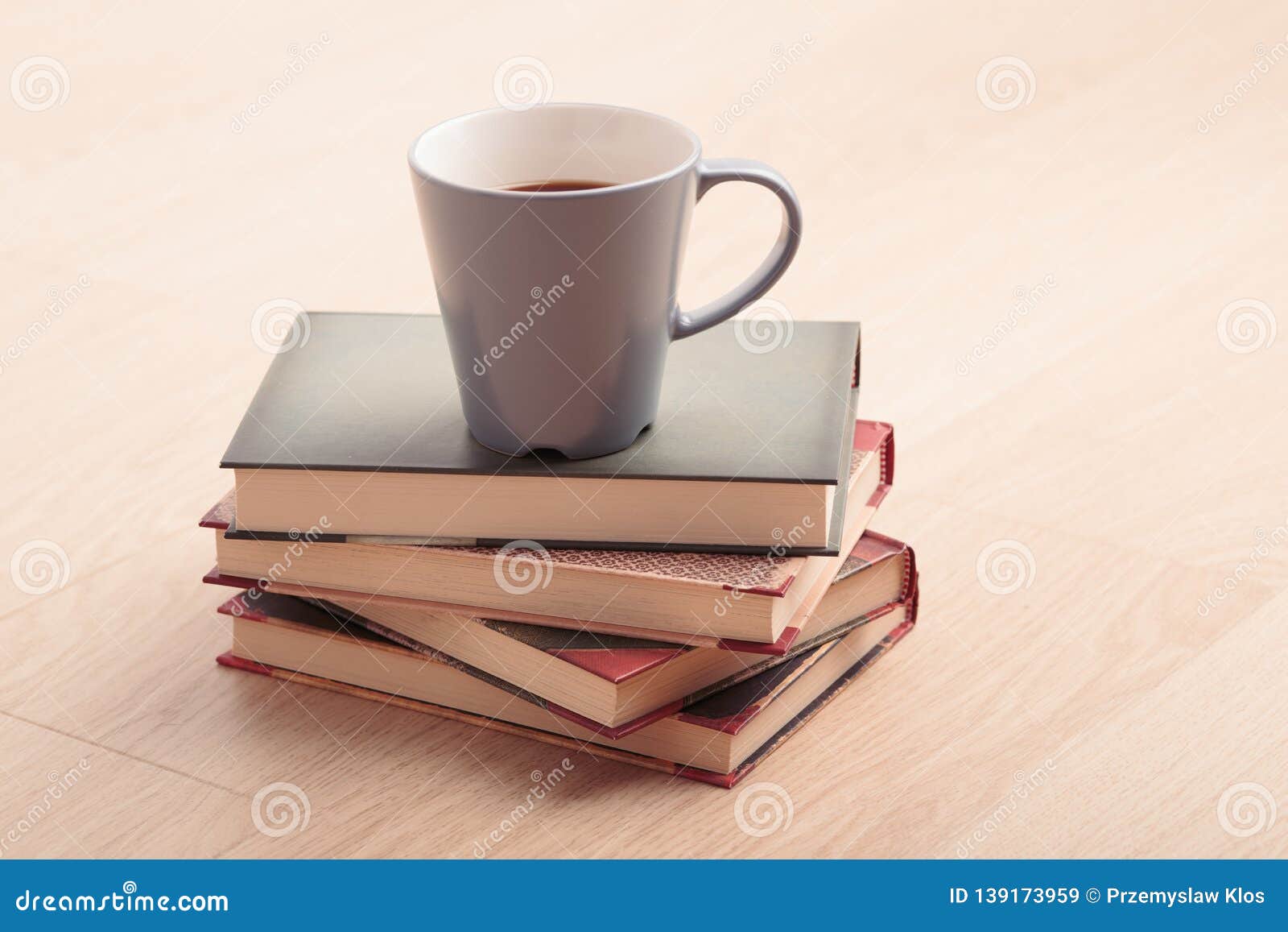 A Few Books with Cup of Coffee on Wooden Floor Stock Image - Image of ...