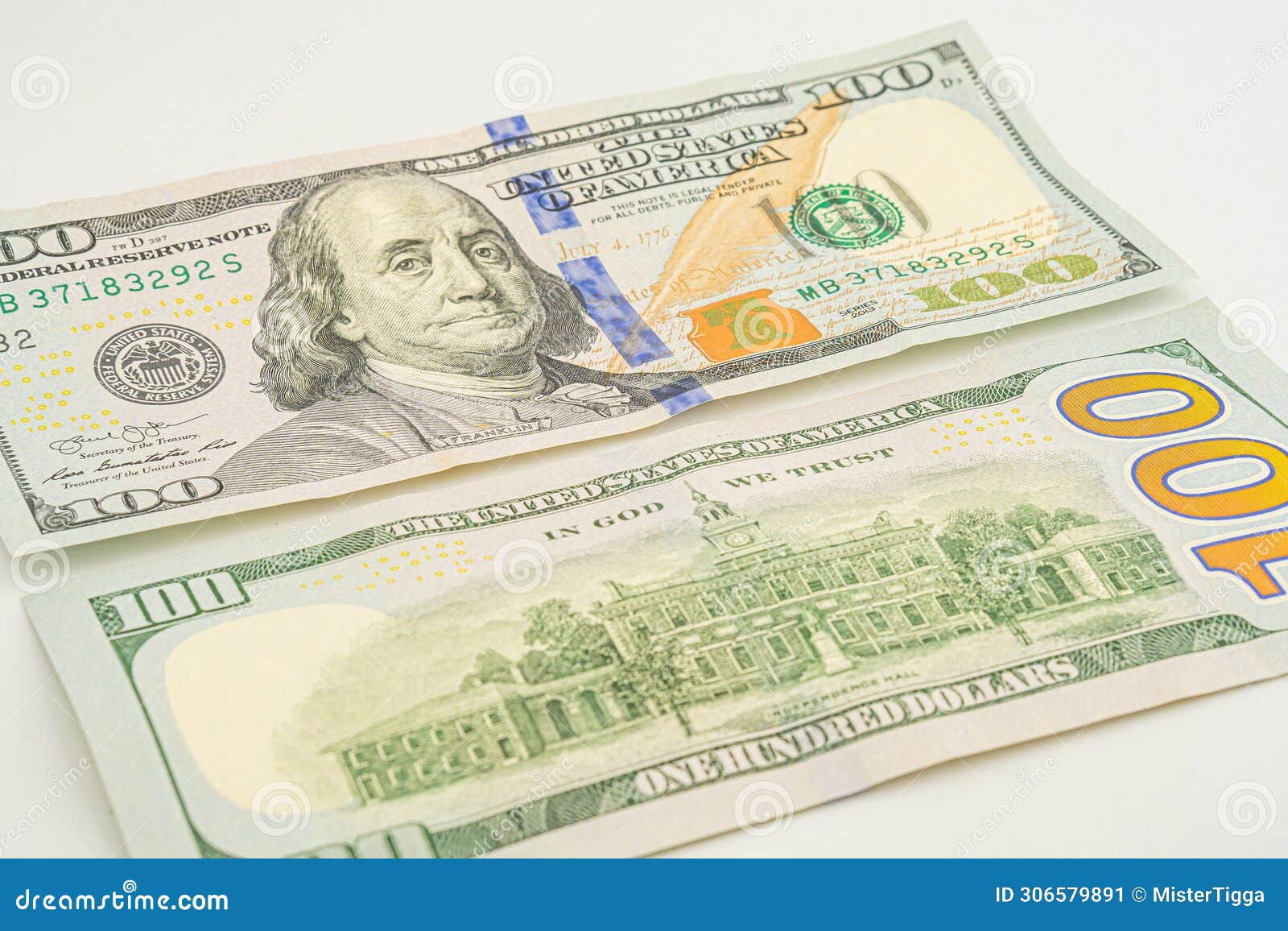 A Few 100 Dollar Bills with the Back Side Lying Around. the Back of a ...