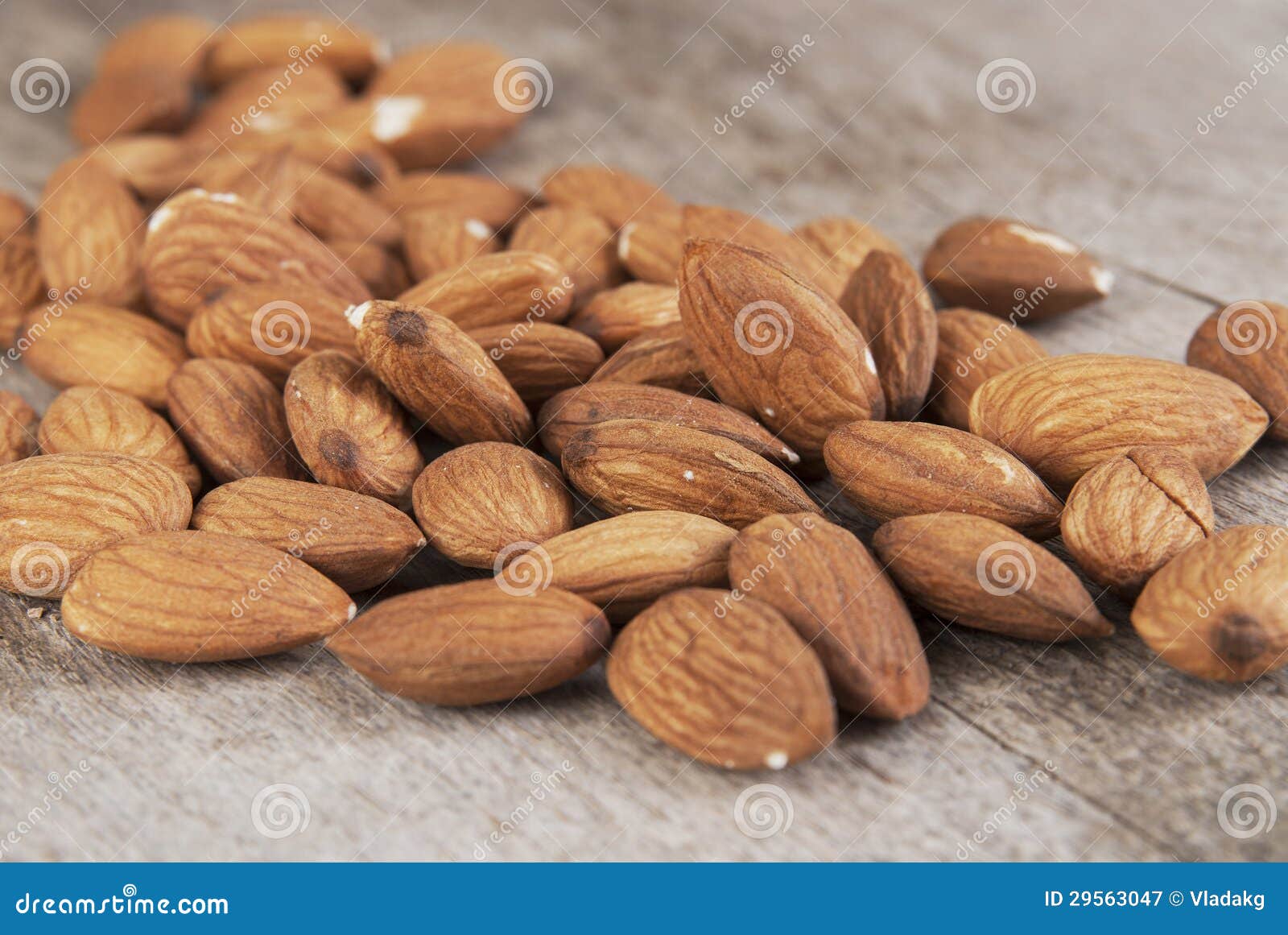 A Few Ripe Nuts of Almond are on a Wooden Surface Stock Image - Image ...