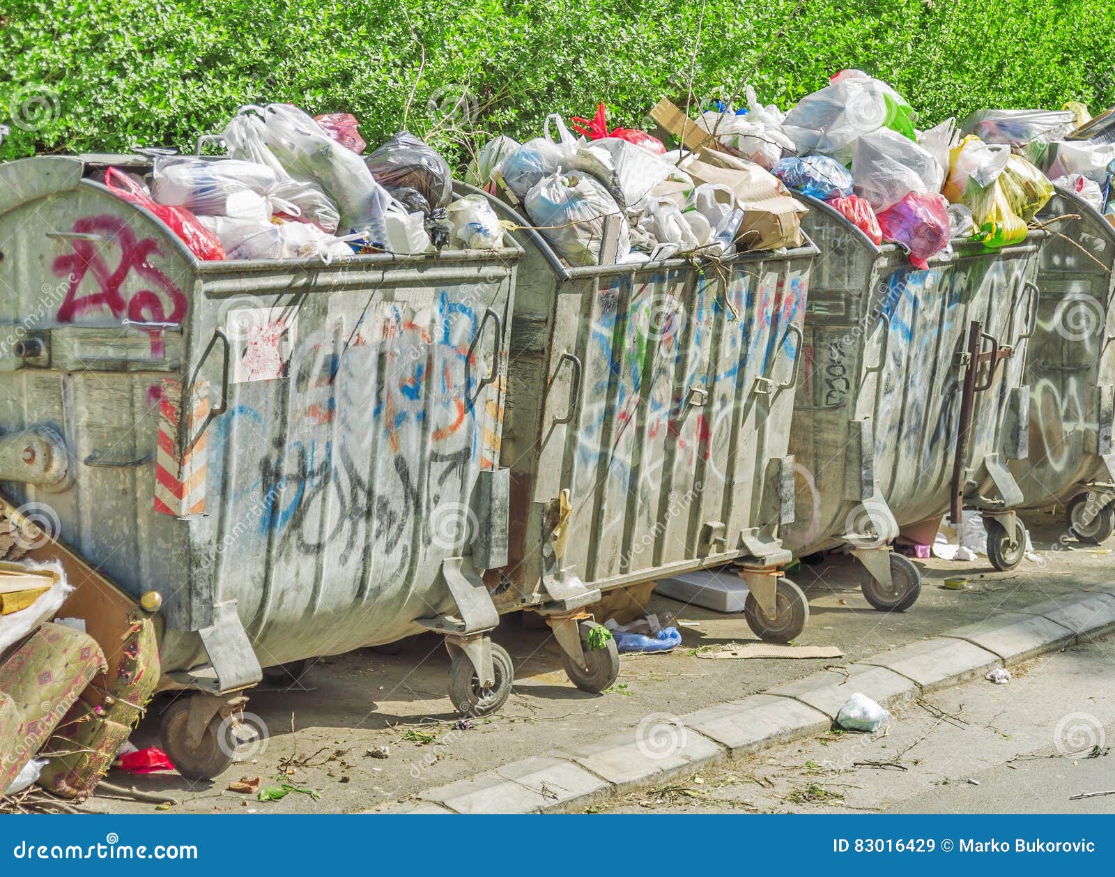 Few Trashcans Full of Garbage Stock Image - Image of street, trees ...