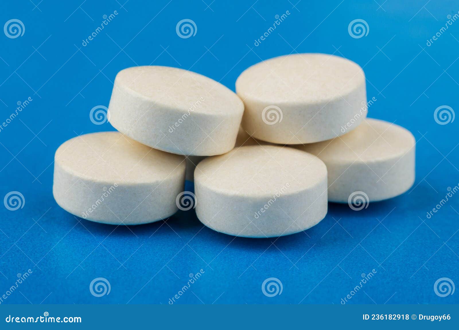 Few White Round Tablets on Table Stock Photo - Image of blue, medicine ...