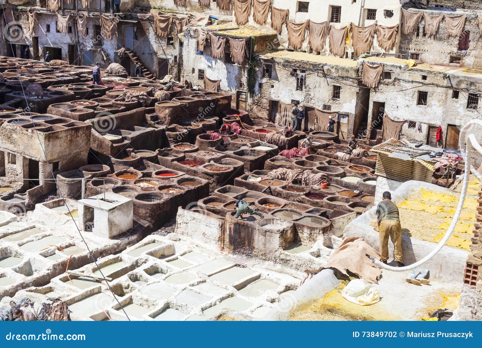 FEZ, MOROCCO - JUNE 10. 2016: Workers at the Chouwara Tannery in ...