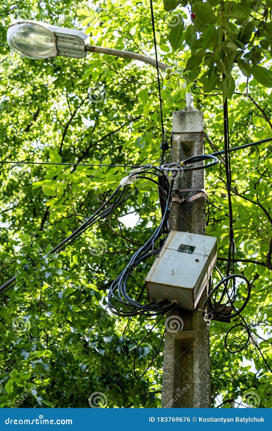 A Fiber Optic Cable Harness for Communication Weighs on a Concrete ...