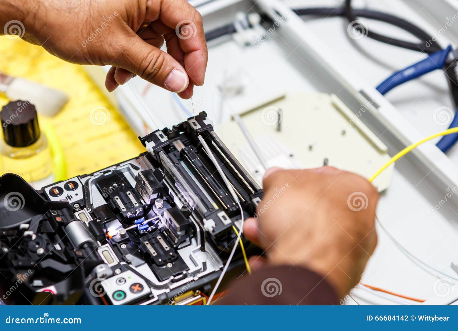 Fiber optic cable install stock photo. Image of broadband - 66684142