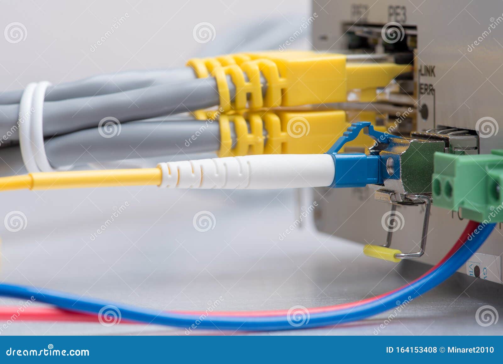 Fiber Optic Cable and Network Ethernet Patch Cord Connect To the Switch ...