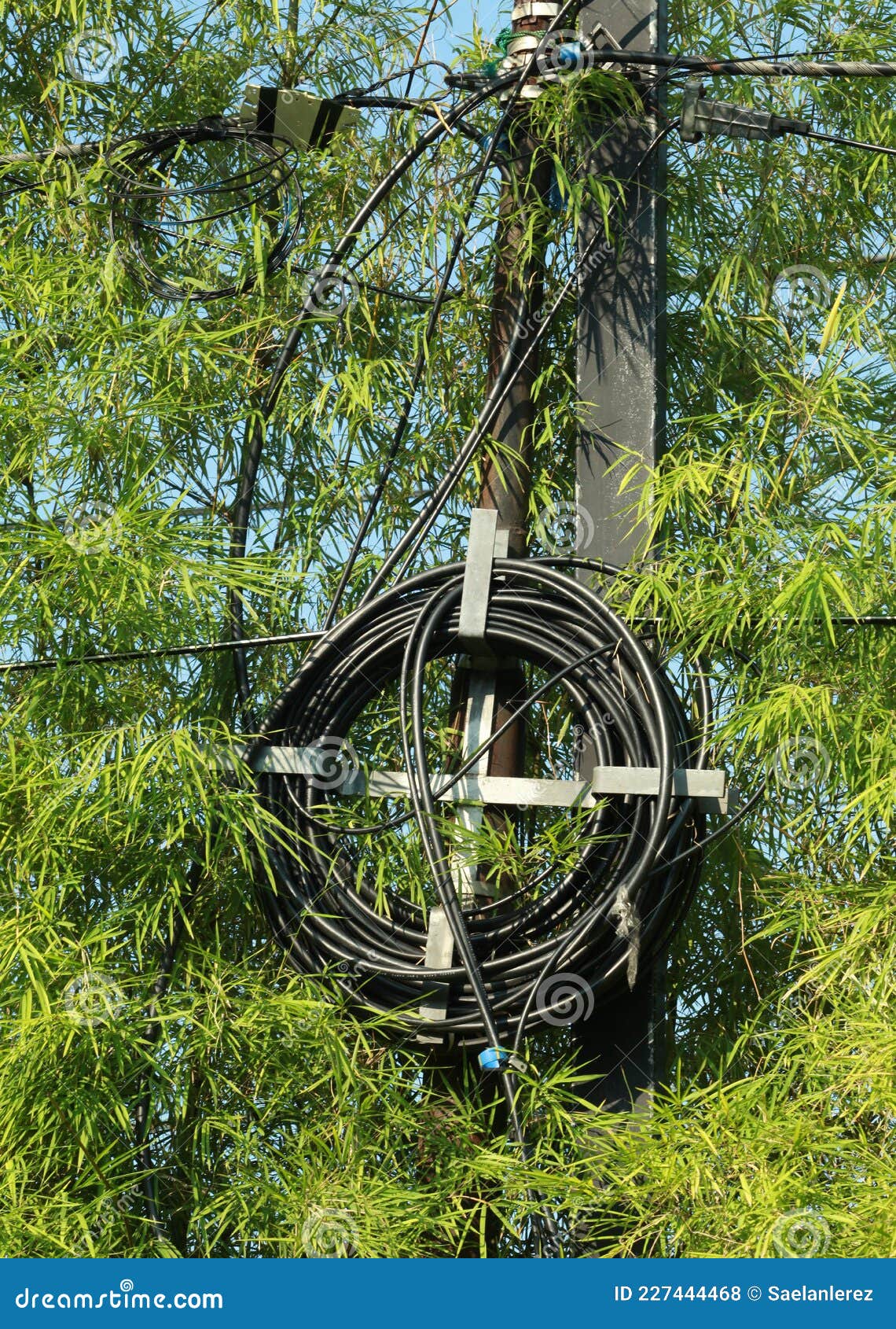 Fiber Optic Cable Reel Hanging on Iron Pole Stock Photo - Image of ...