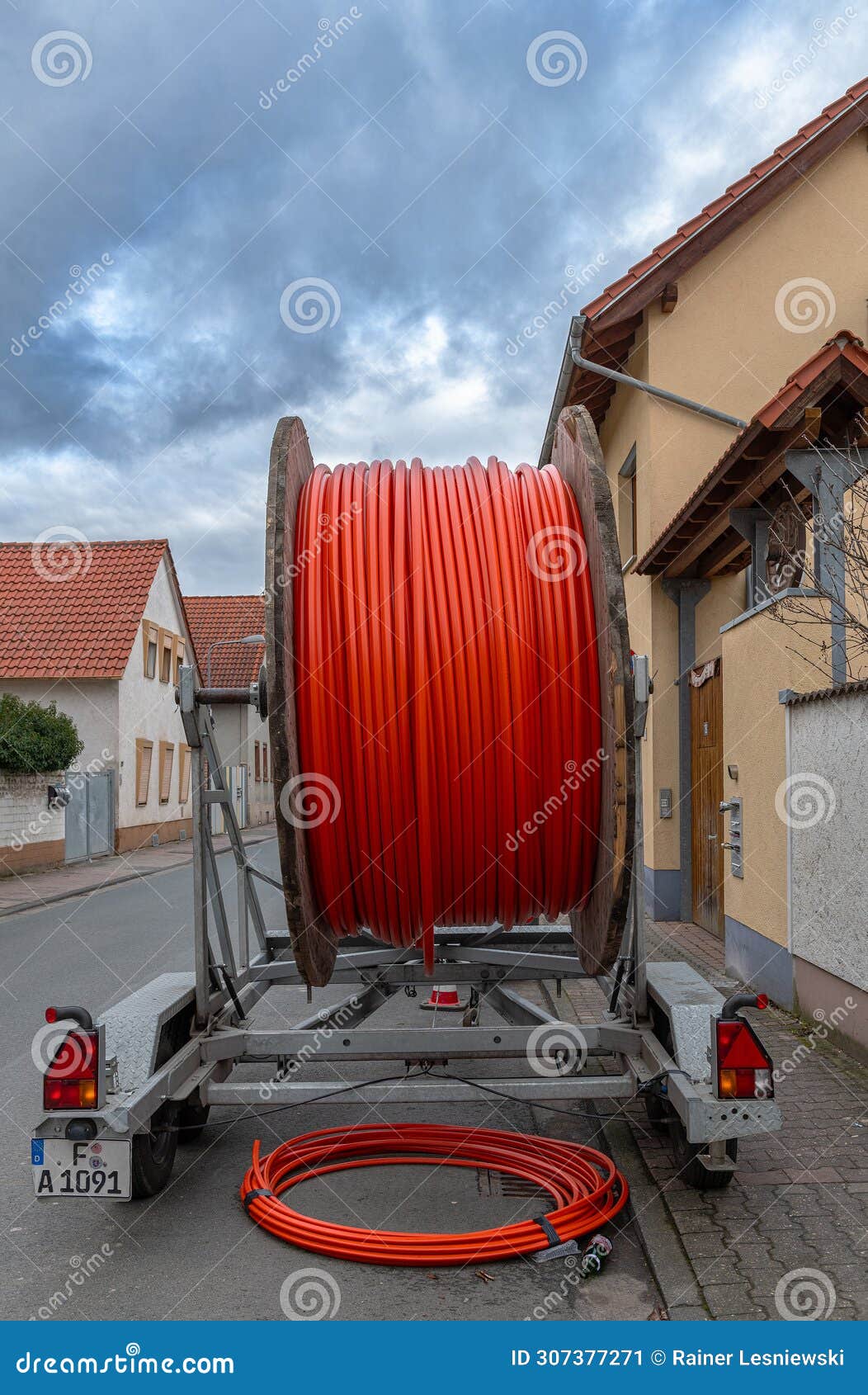 Fiber Optic Cable Reel on a Roadside Trailer Editorial Photo - Image of ...