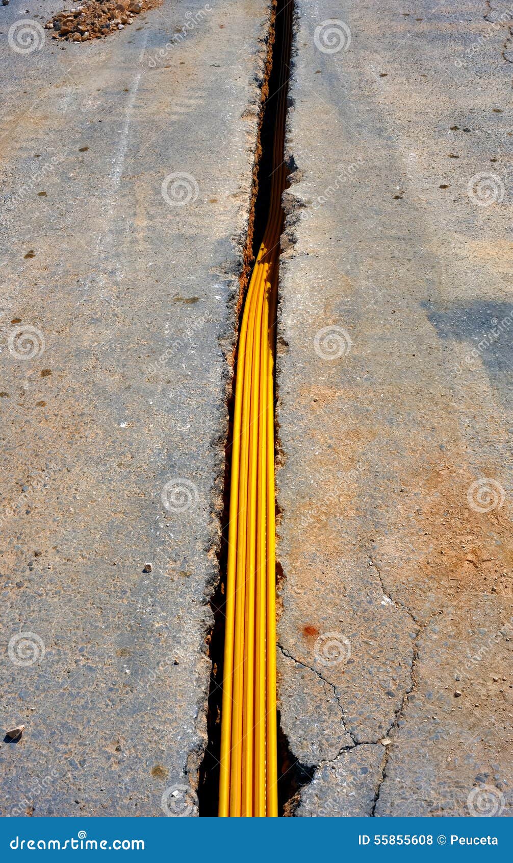Fiber Optic Cables Buried in a Micro Trench Stock Photo - Image of ...