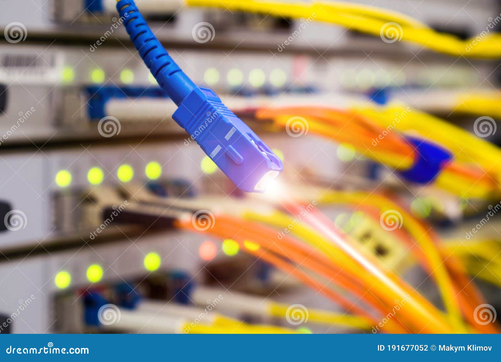 Fiber Optic Patch-Cord is Shown Close-up in the Server Room of the Data ...