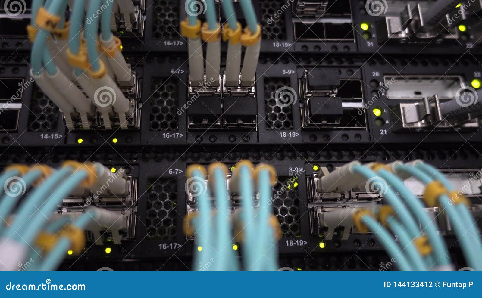 Fiber Optic Patch Cords Plugged into a Network Switch or Router with ...