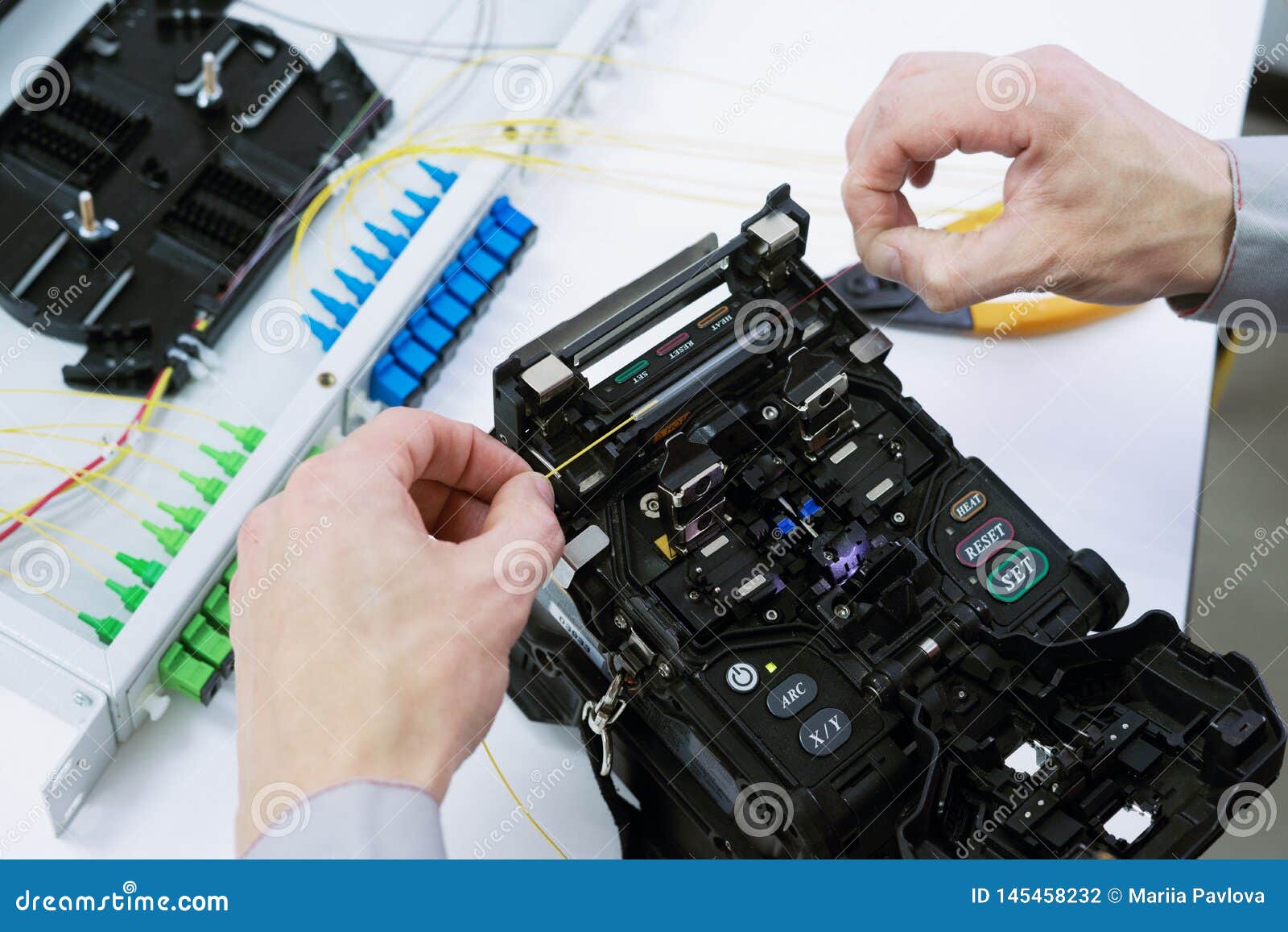 Fiber Optic Splicing by Fusion Splicing Machine Stock Photo - Image of ...