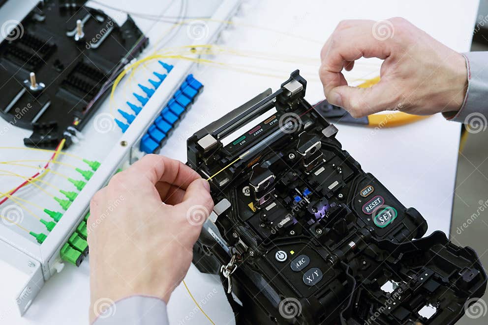 Fiber Optic Splicing by Fusion Splicing Machine Stock Photo - Image of ...