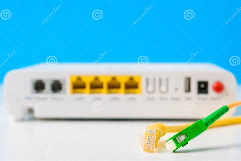 Fiber Optical and Network Cables with Internet Wireless Router on a ...