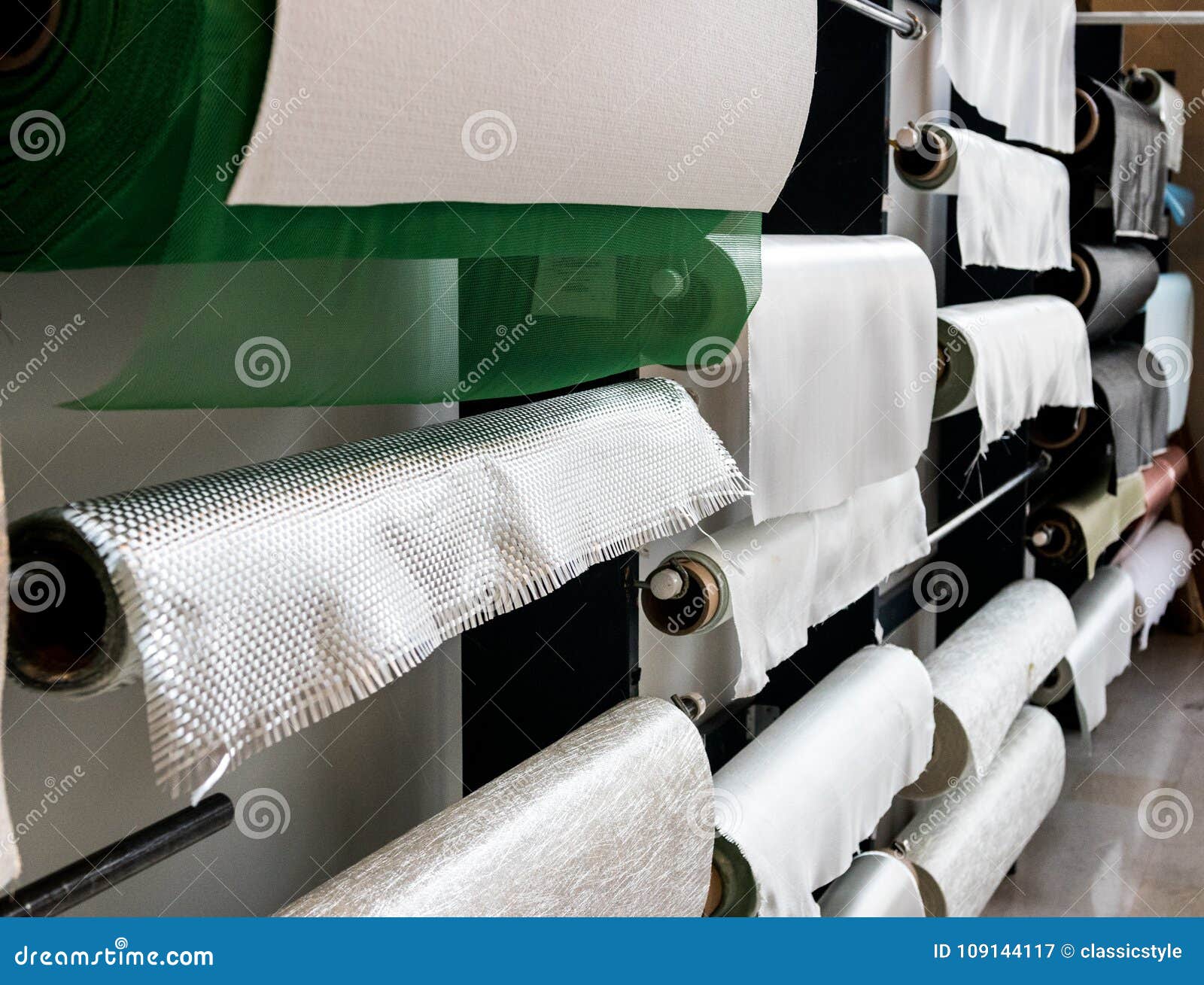 Fiberglass Composite Fabric Rolls Hanging on a Wall Stock Image - Image ...