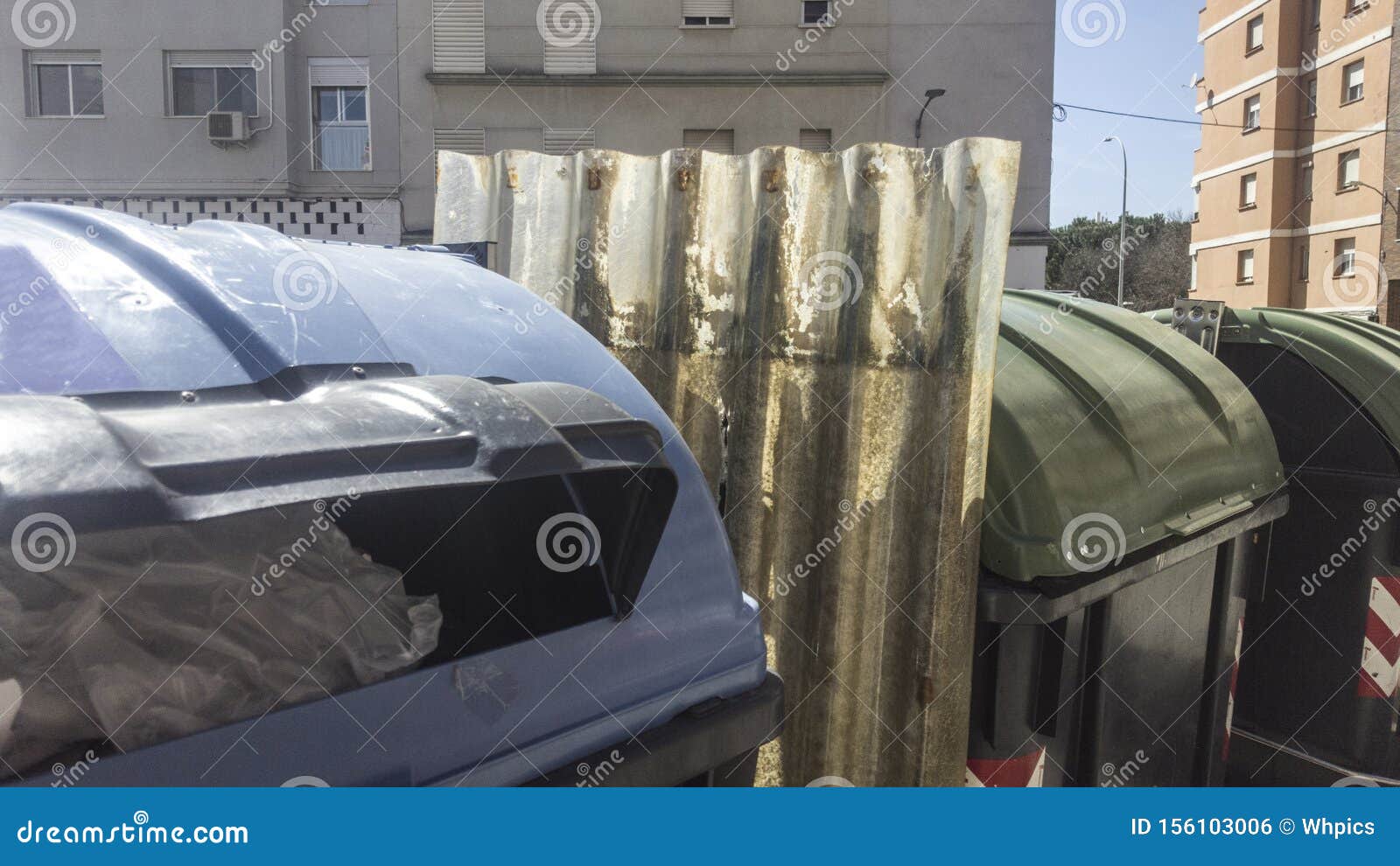 Fibre Cement Corrugated Sheets Thrown between Trash Cans Stock Photo ...