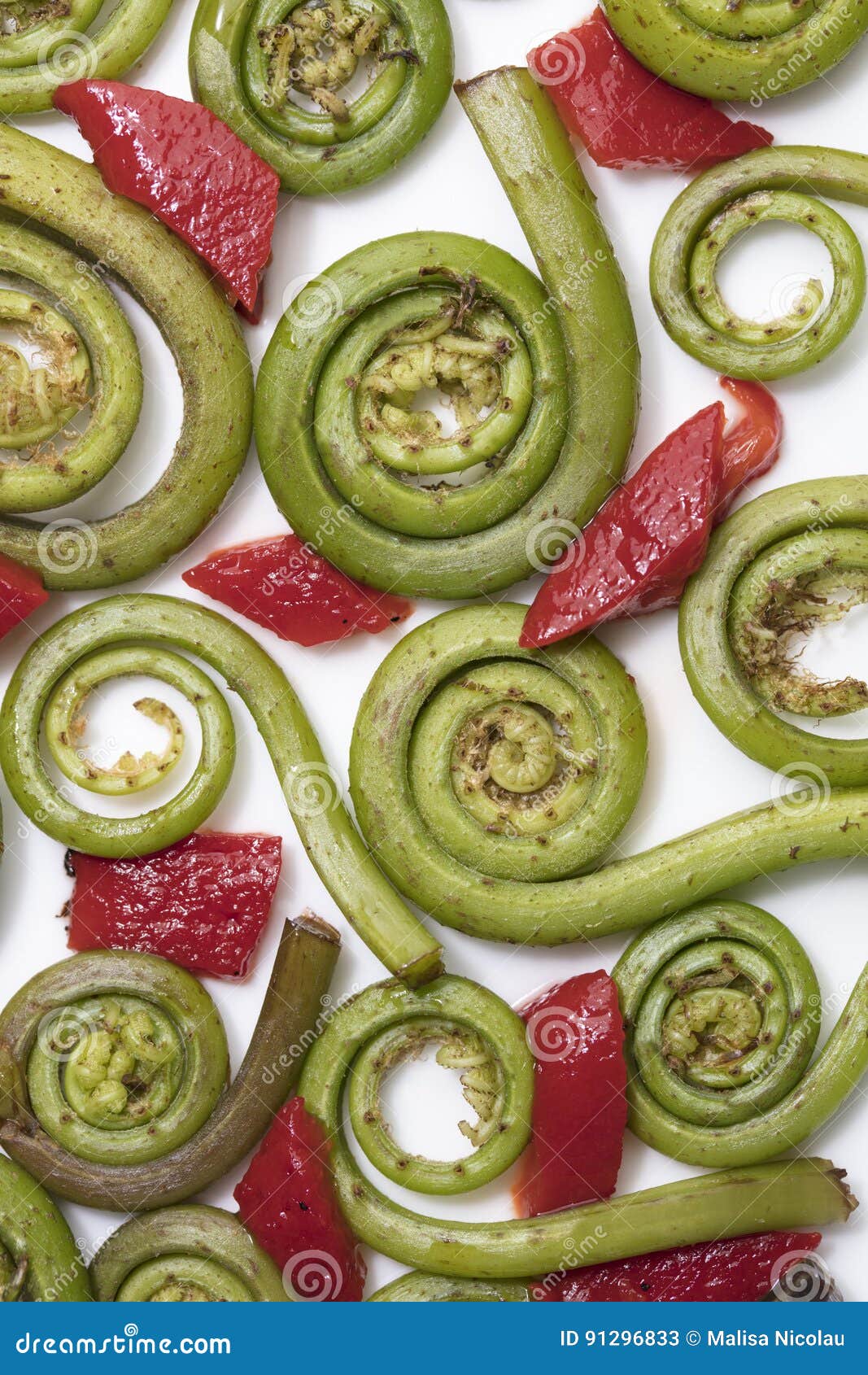 Fiddlehead Ferns and Red Pepper Pieces Stock Image - Image of curly ...