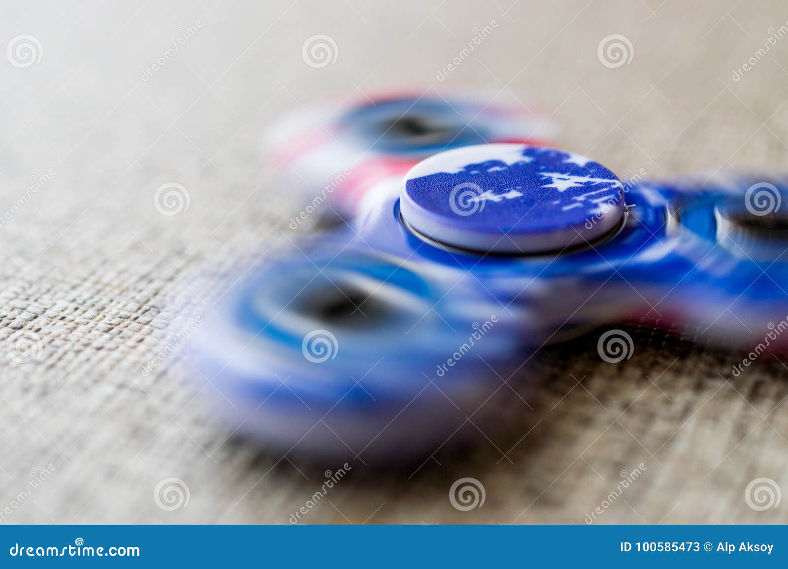 Fidget Spinner on a Grey Surface. Stock Image - Image of focus, play ...