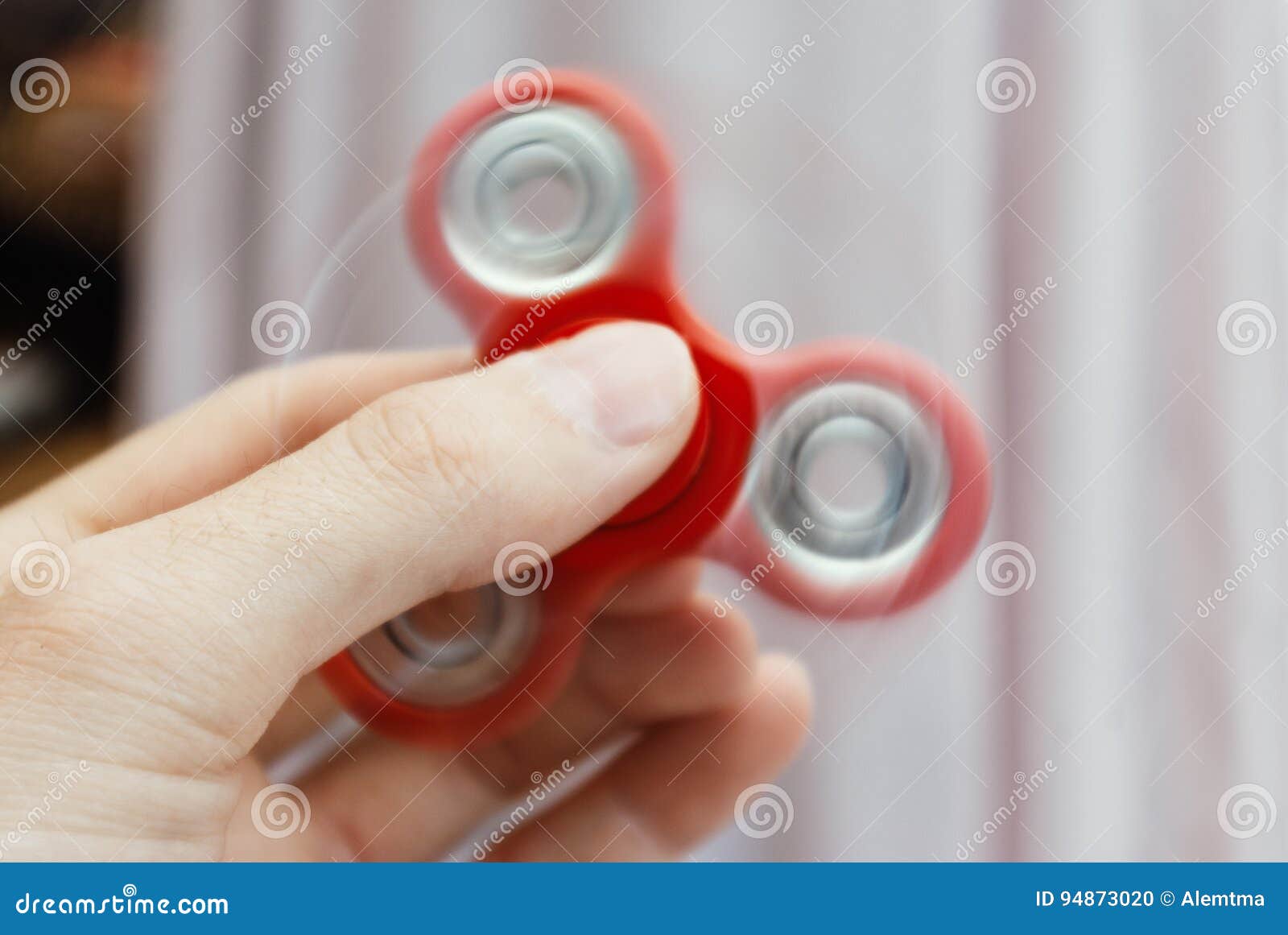 Fidget Spinner Rotating in the Hand. Stock Photo - Image of energy ...