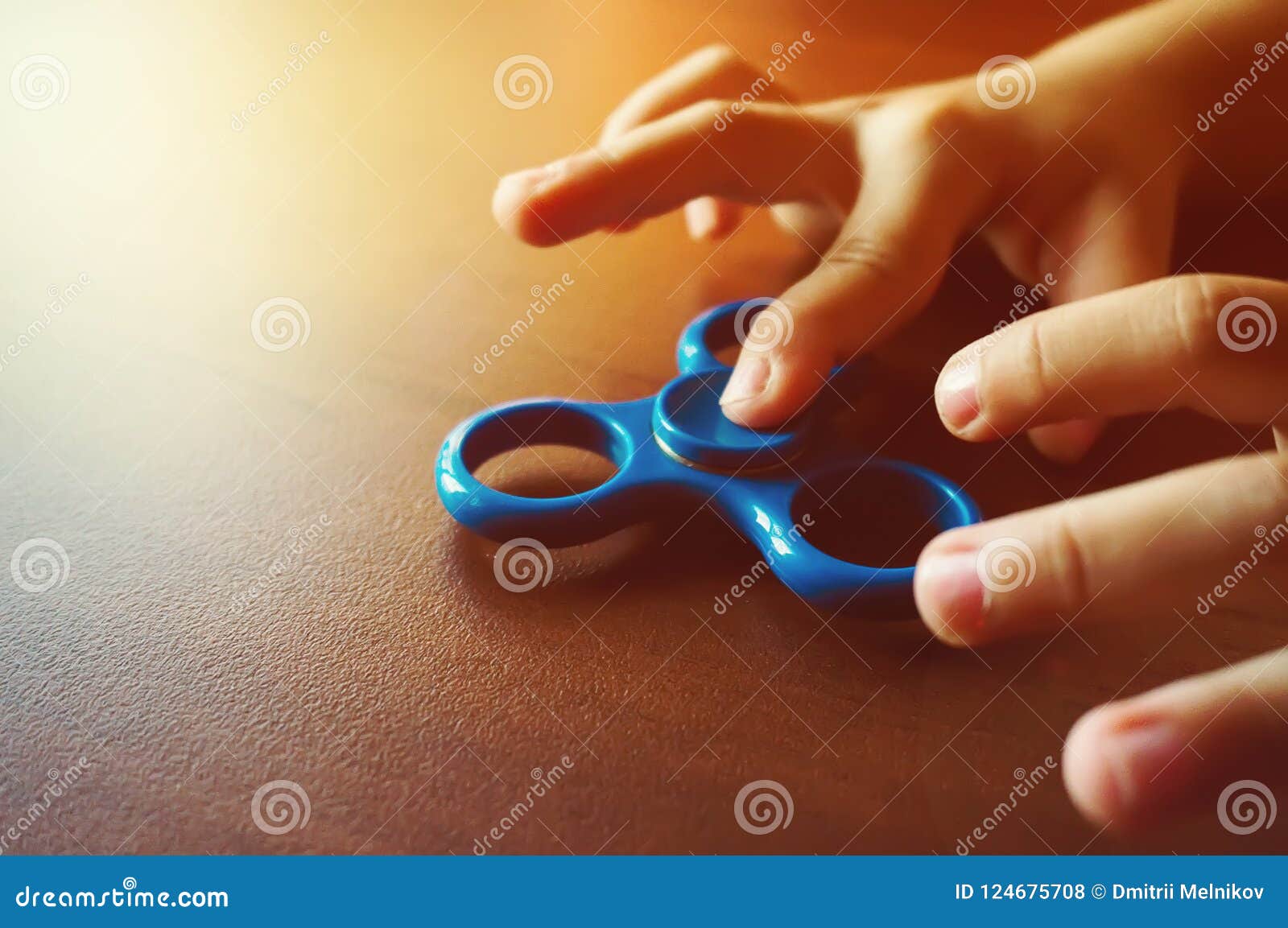 Fidgeting Hand Toy Rotating on Child S Finger Stock Photo - Image of ... Fidgeting Hand Toy Rotating on Child S Finger Stock Photo - Image of ...