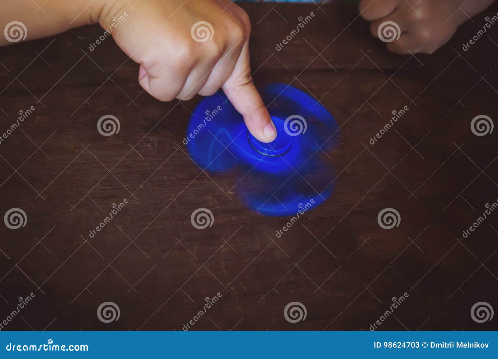 Fidgeting Hand Toy Rotating On Child S Finger Stock Image - Image of ... Fidgeting Hand Toy Rotating On Child S Finger Stock Image - Image of ...