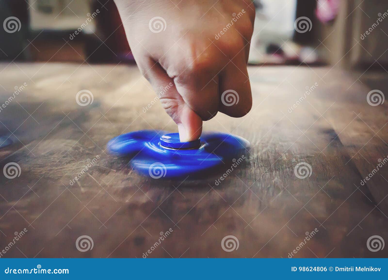 Fidgeting Hand Toy Rotating On Child's Finger Stock Photo - Image of ... Fidgeting Hand Toy Rotating On Child's Finger Stock Photo - Image of ...