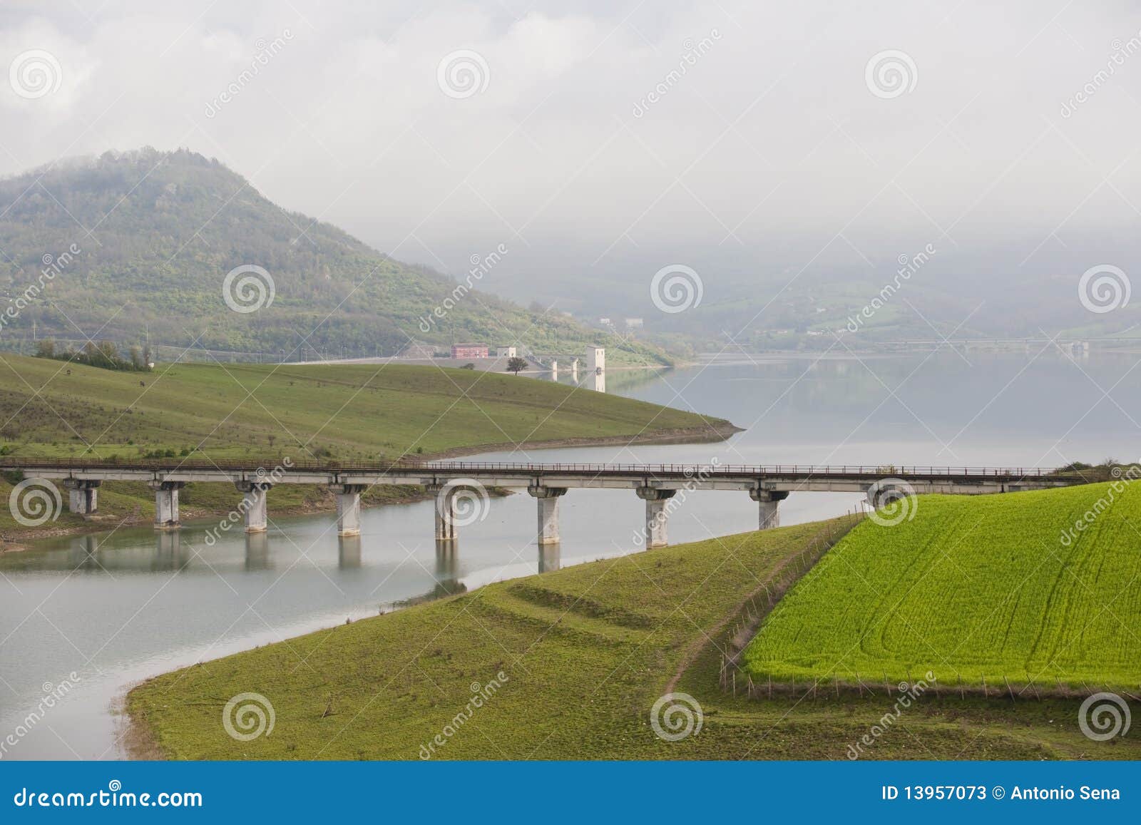 Field bridge and lake with stock image. Image of clear - 13957073