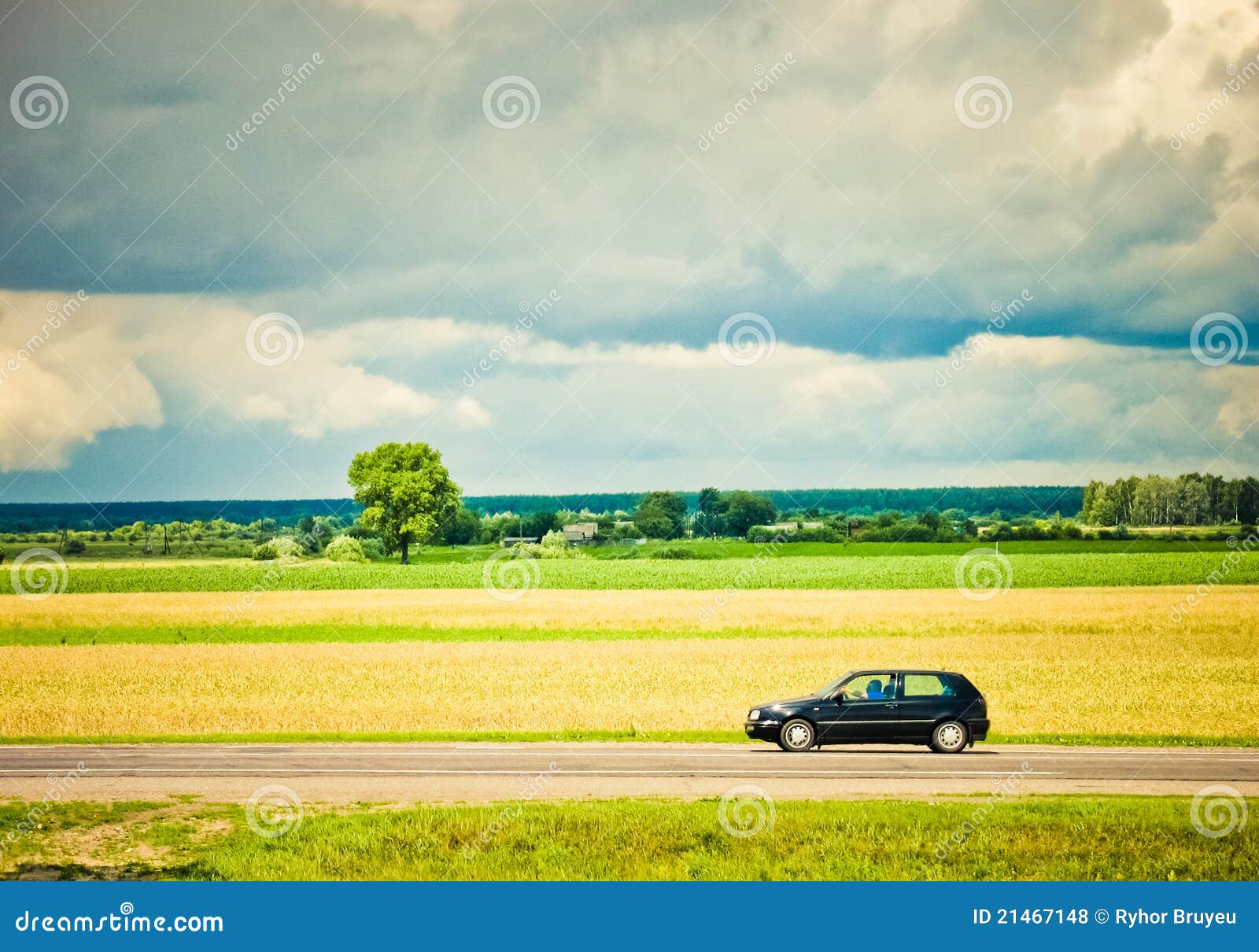 Field and car on a road stock photo. Image of fast, alone - 21467148