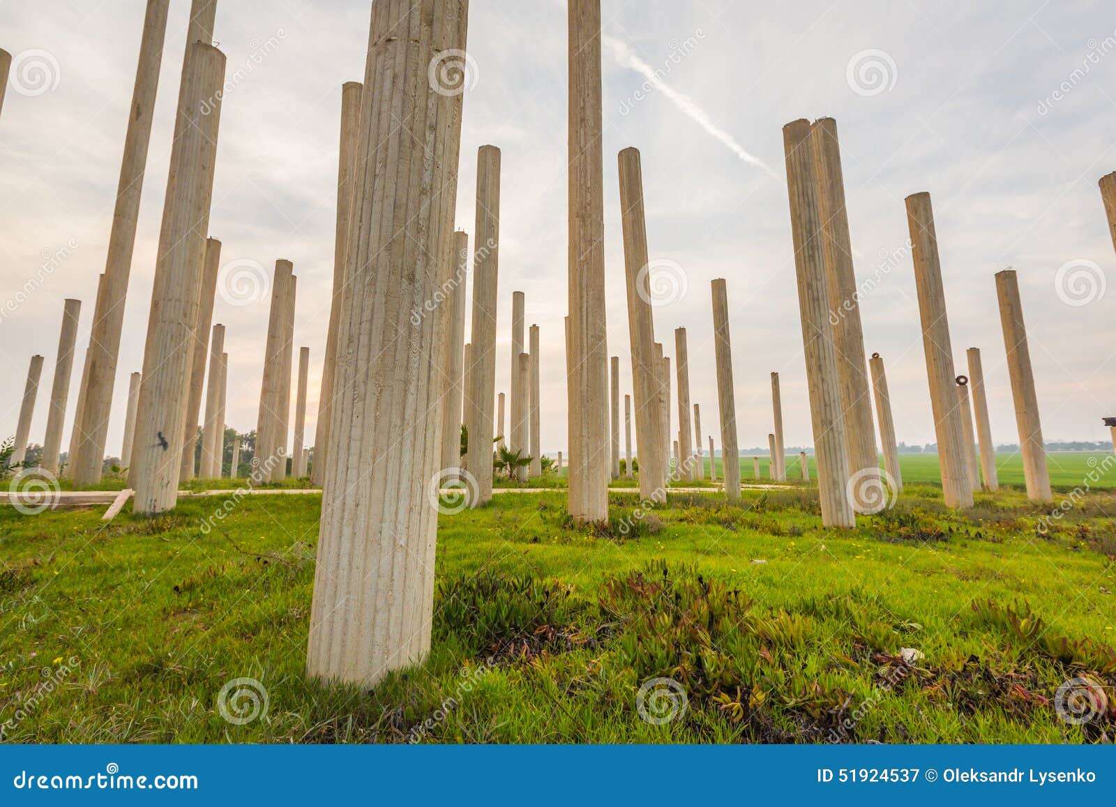 Field with Concrete Pillars Stock Image - Image of cloudscape ...