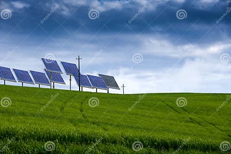 Field of Grass and Solar Power Stock Photo - Image of cumulus, ecology ...