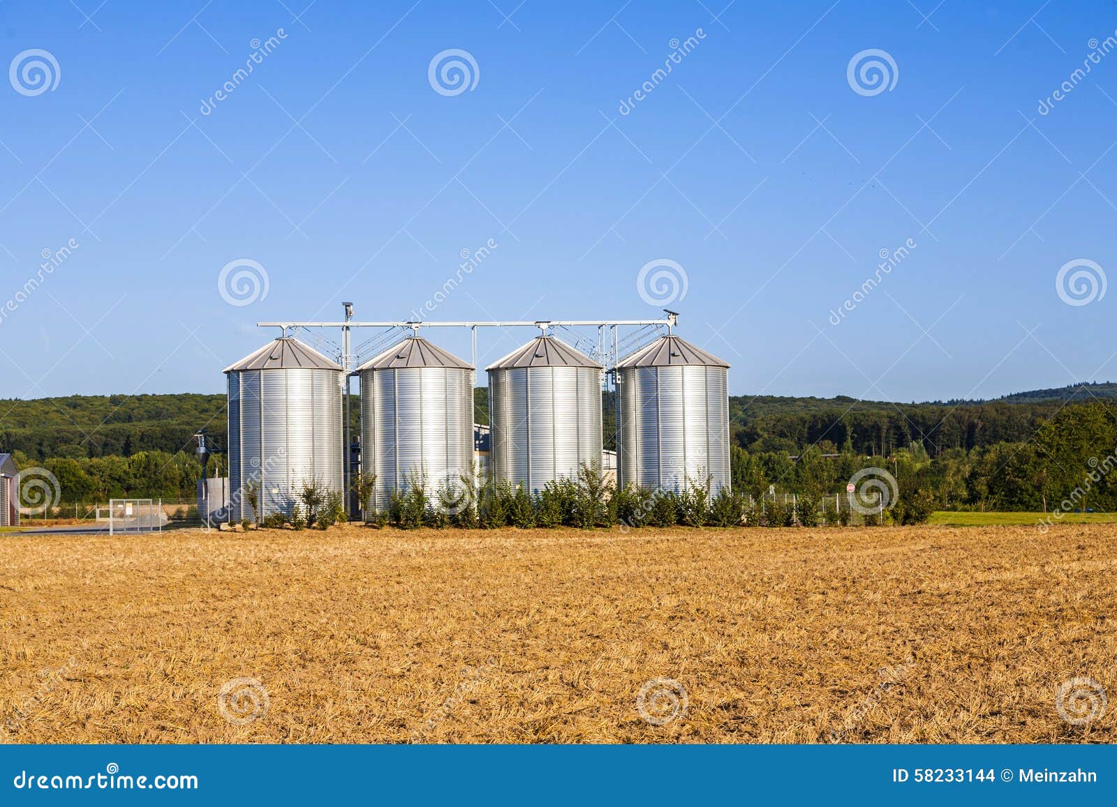 Field in harvest with silo stock photo. Image of harvest - 58233144
