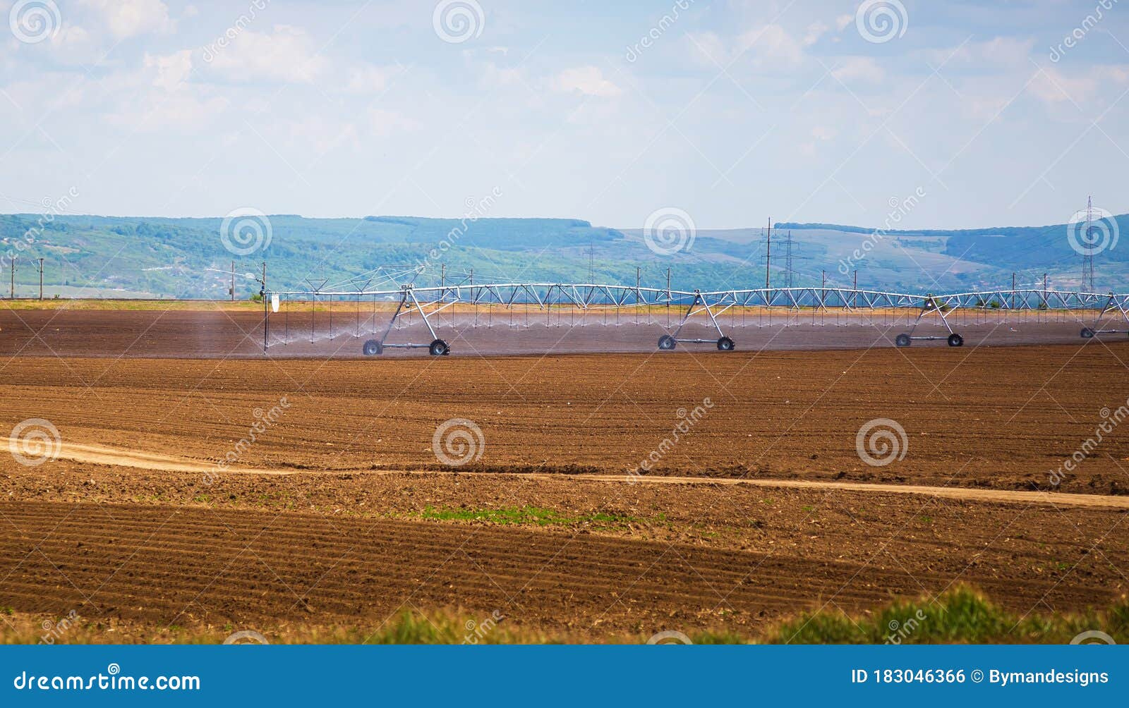 Field Irrigation System. an Irrigation Pivot Watering a Field Stock ...