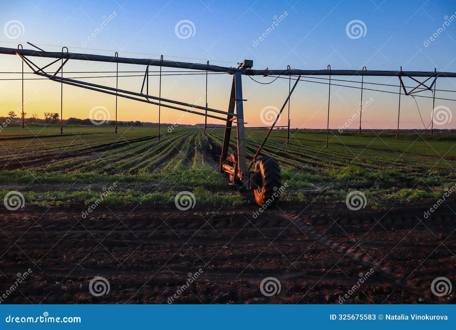 Field with Mobile Irrigation System for Water Supply. Stock Image ...