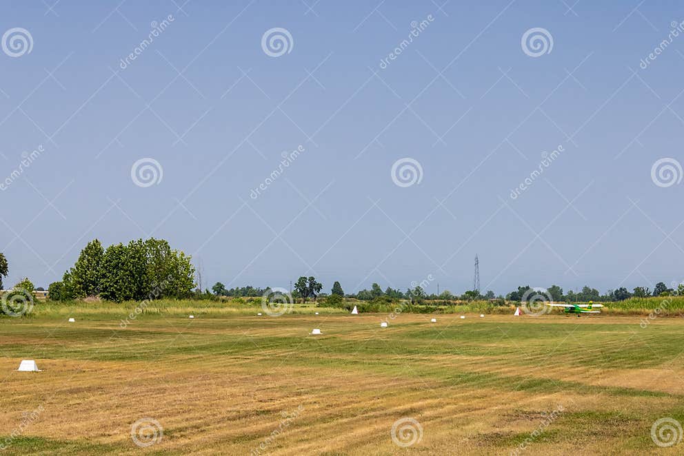 The Field with Runway and Small Aircraft, Grass Field Runway - Image ...