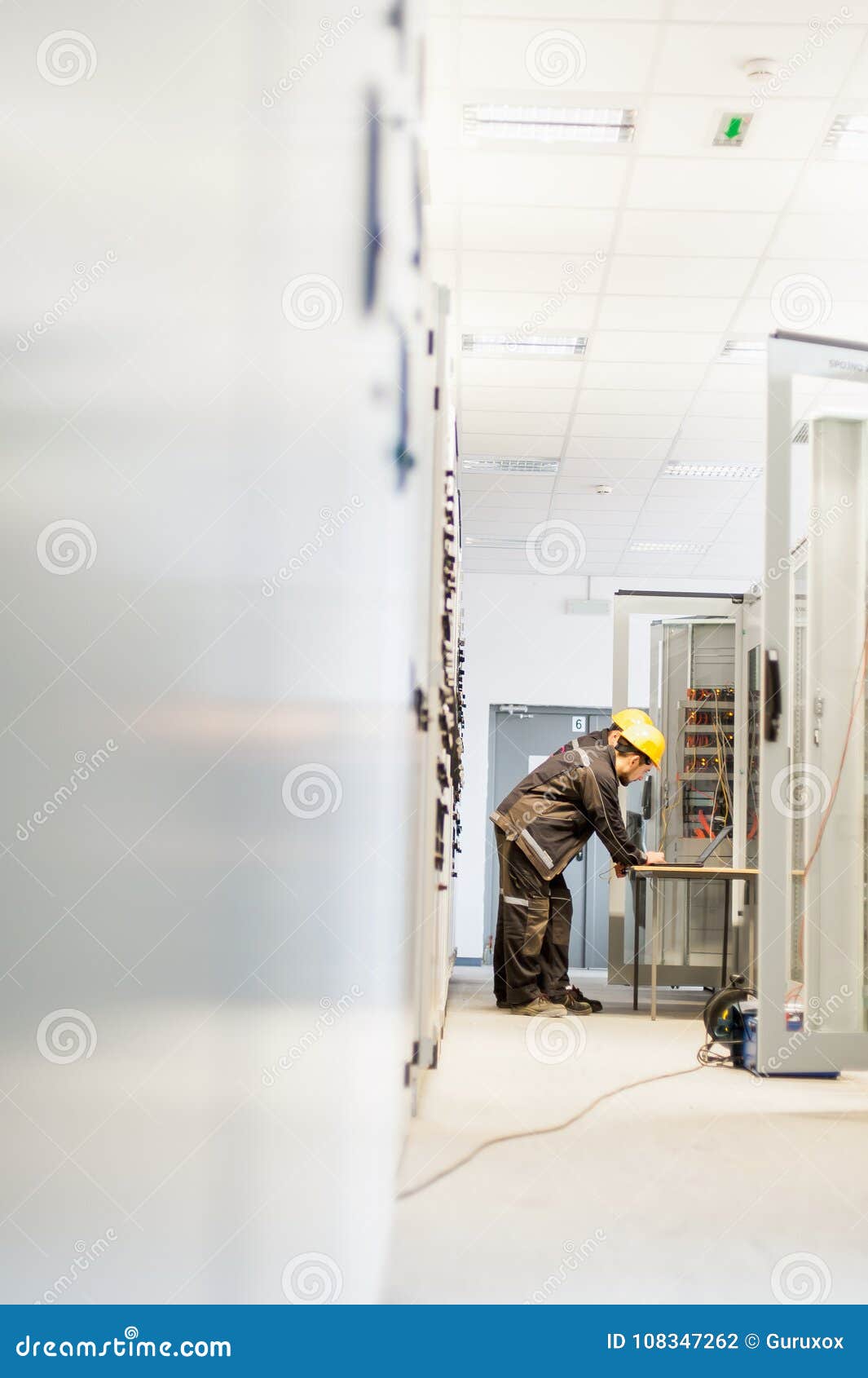 Field Service Crew Testing Electronics or Inspecting Electrical Stock ...