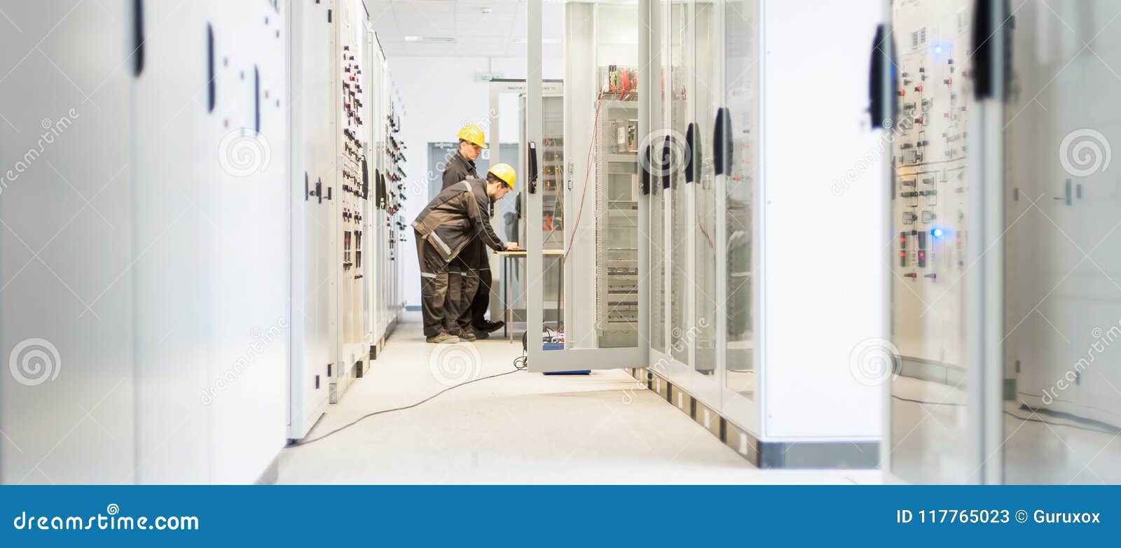 Field Service Crew Testing Electronics or Inspecting Electrical Stock ...